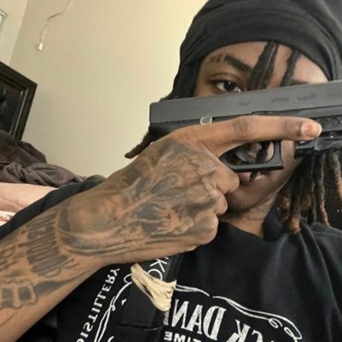 Lil Reese Holding Gun